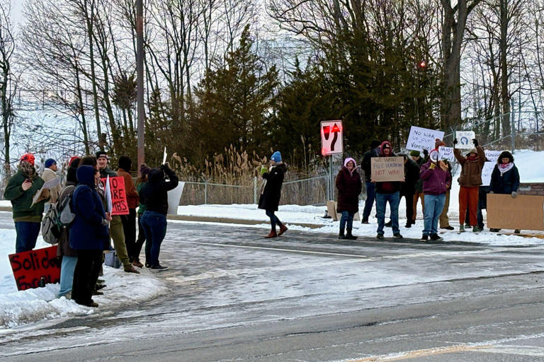 Protesters gather at Stewart base as Venezuela's Maduro arrives