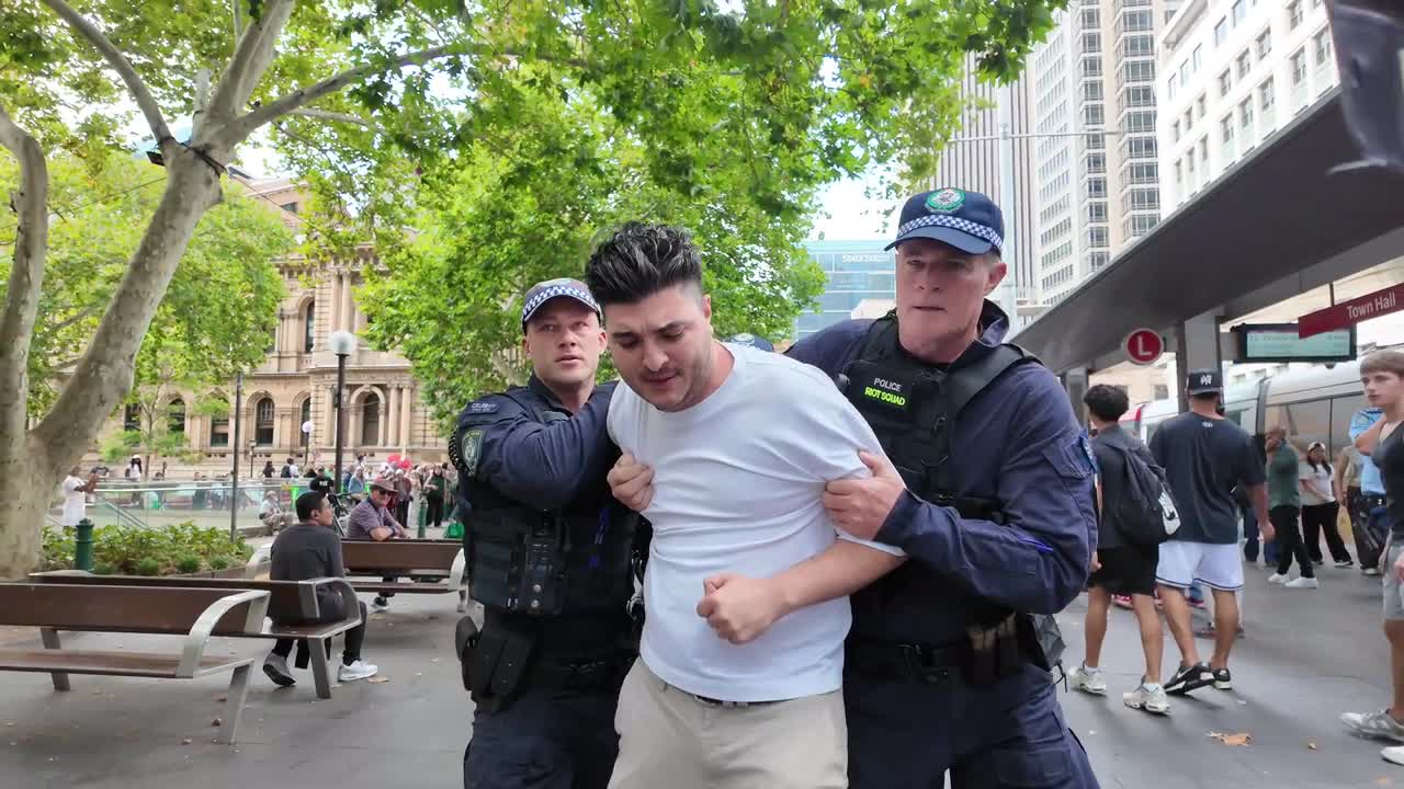 Activist Drew Pavlou is arrested by police in Sydney, Australia