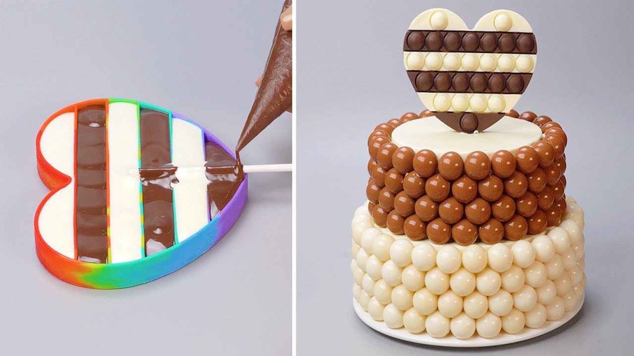 Heart-shaped chocolate decoration and layered chocolate cake