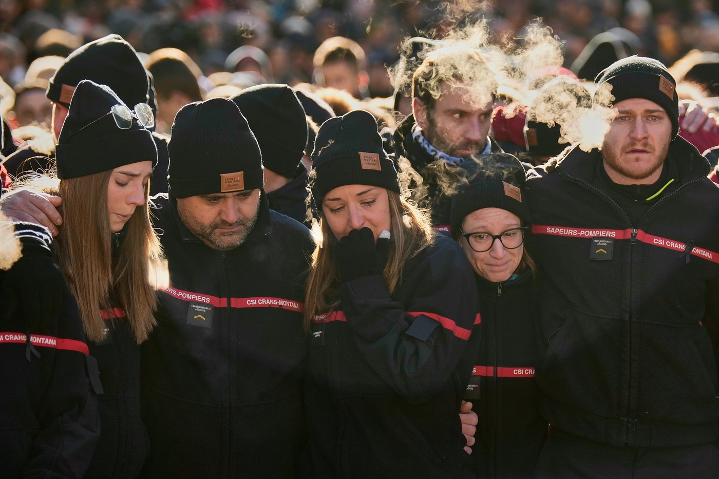 Hundreds march in silence to honor victims of Swiss bar fire that left ...