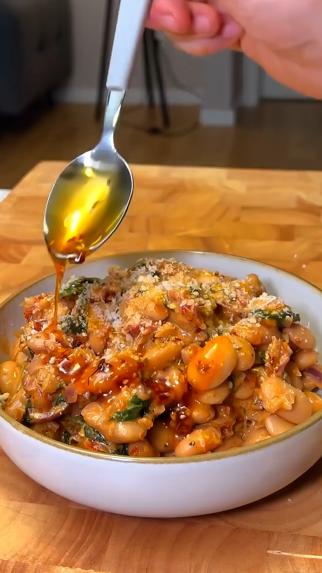 Cooking a creamy vegan skillet with beans and oil