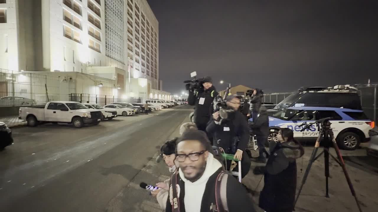 Members of the media wait behind police barrier for Maduro arrival at ...