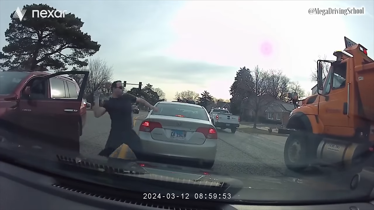 Road chaos as car spins out of control