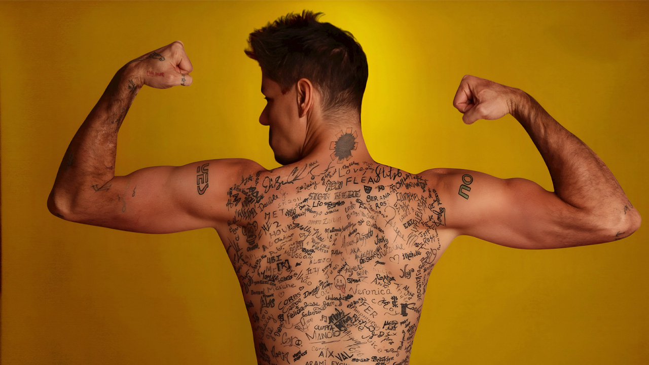 Tattoo artist sets world record with 273 tattooed signatures ...