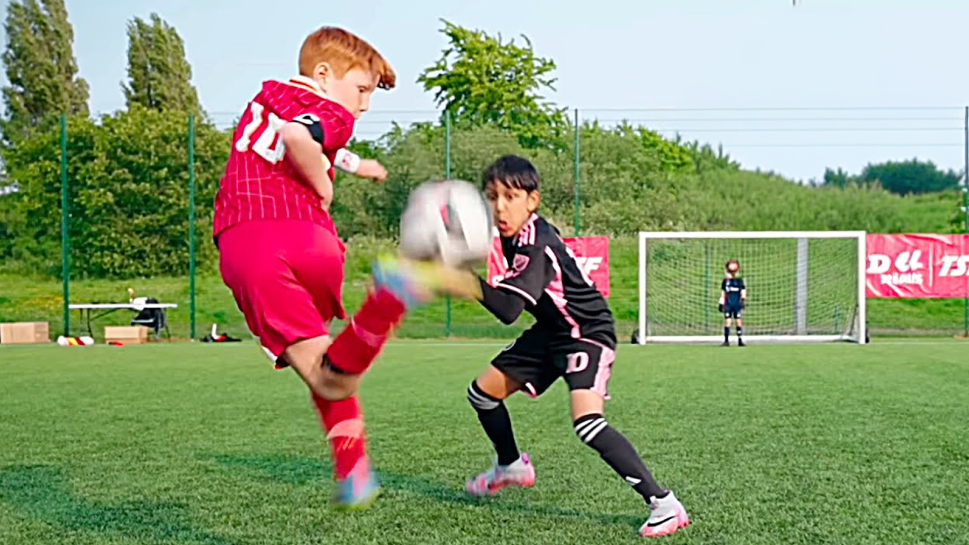 Kids embarrass each other during football match