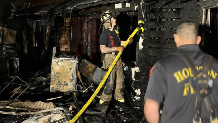 Man discovered dead following a fire at a house for sale in southeast ...