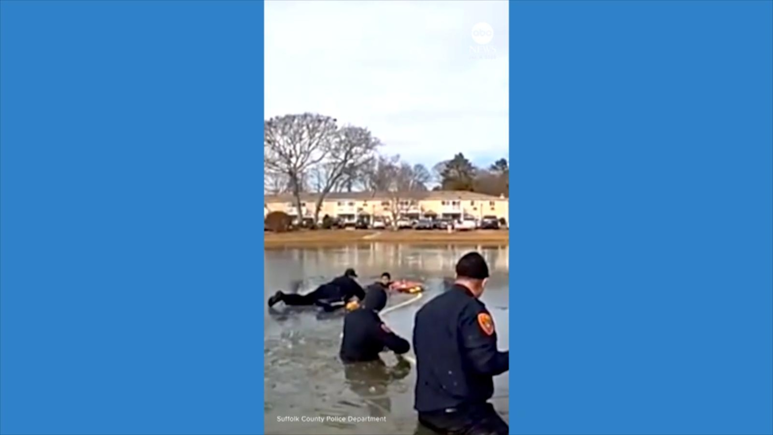 Police officers rescue boy from icy pond