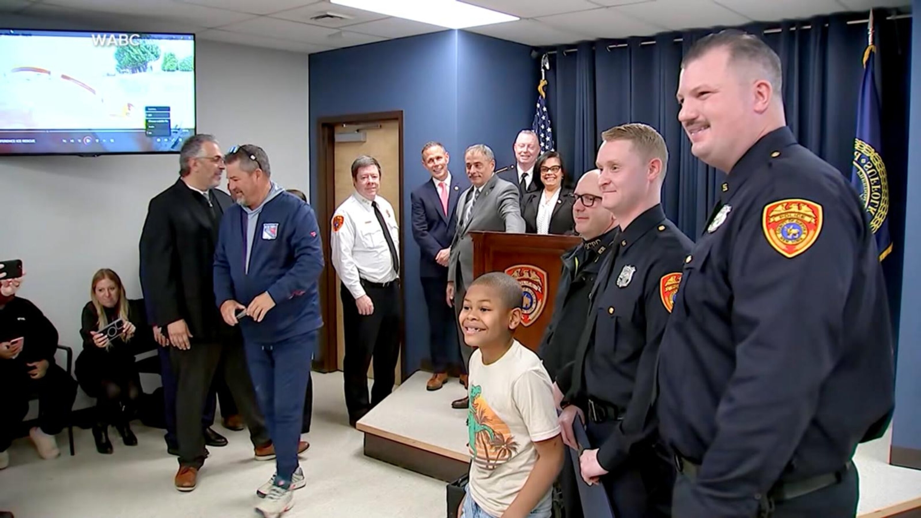 Boy rescued from icy pond reunites with hero officers
