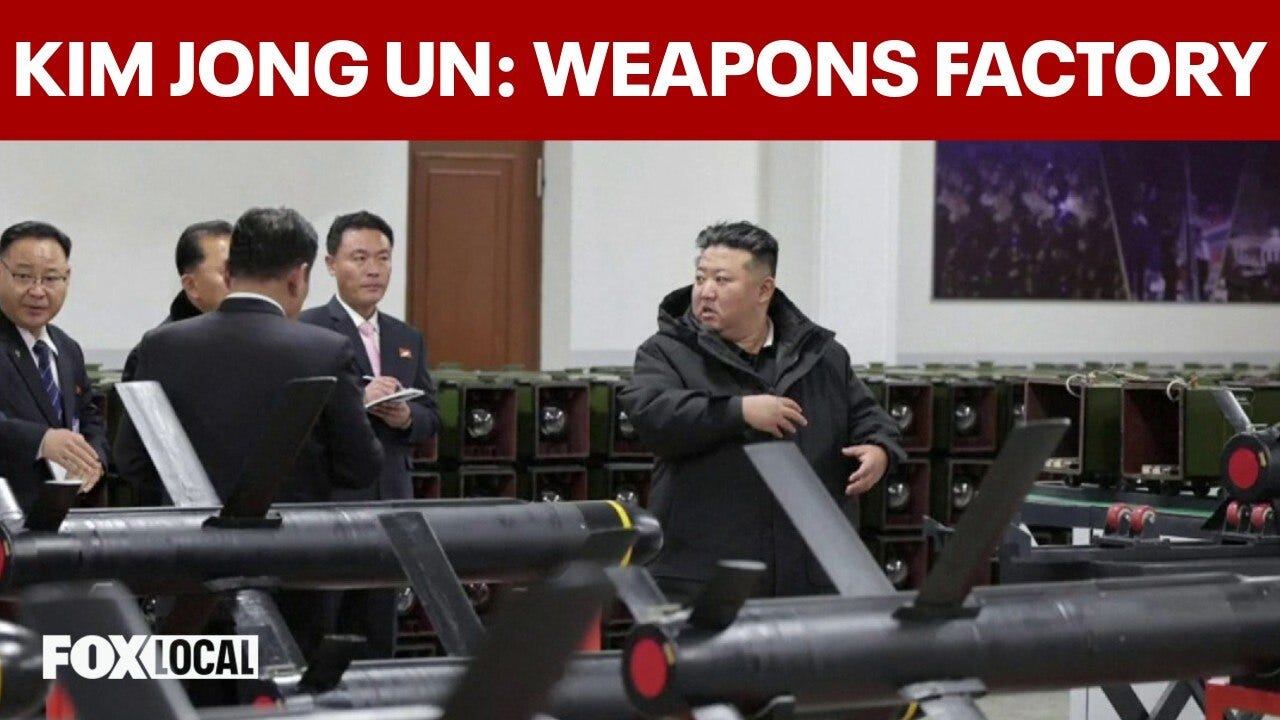 Kim Jong Un tours weapons factory as North Korea fires ballistic missiles