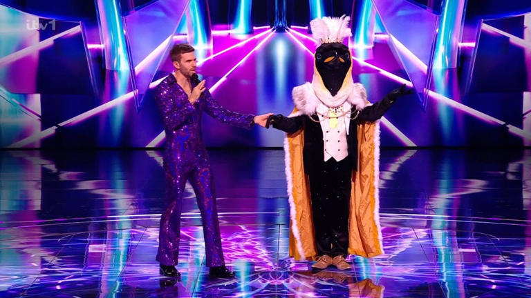 Masked singer unmasks another contestant