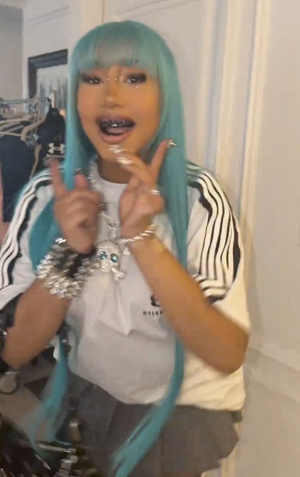 North West, 12, shows off new bridge piercing, blackened teeth and 106 ...