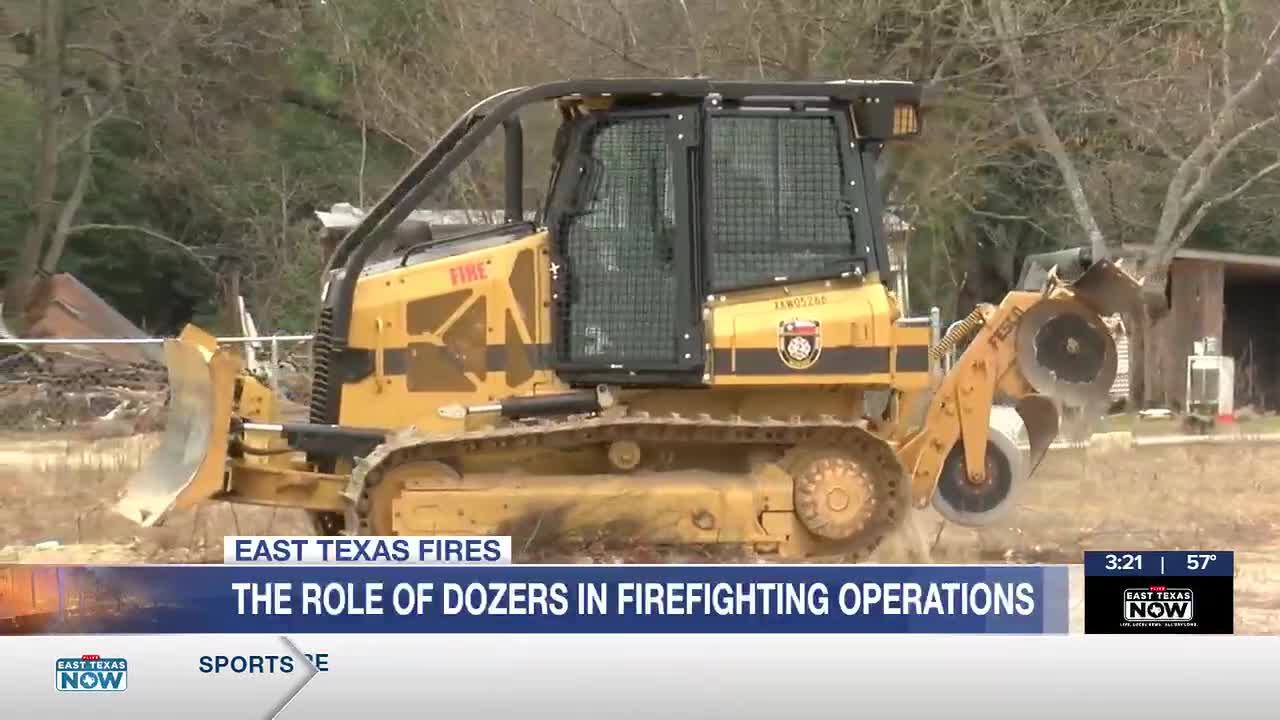 Smith County firefighters use dozers to combat grass fires