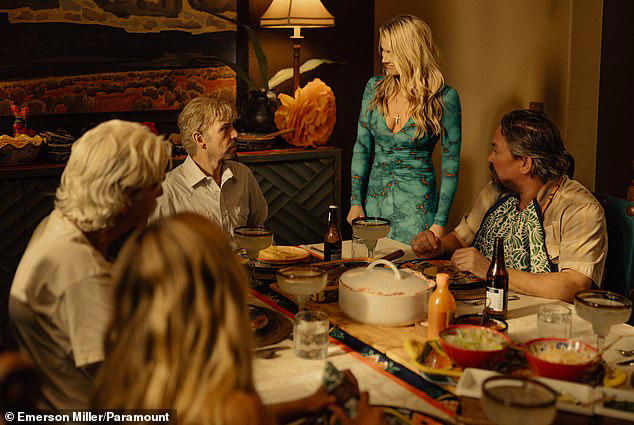 Ali Larter takes the plunge in black silky dress to present at 2026 ...