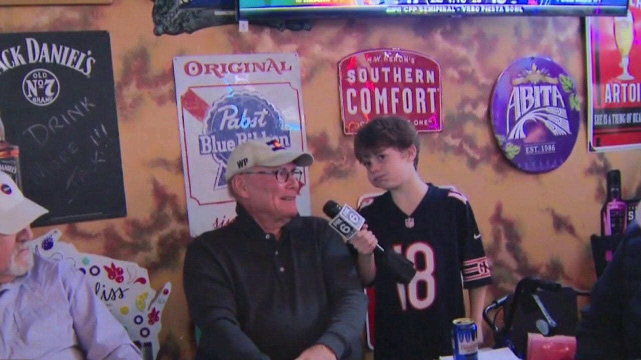 Touchdown Tommy interviews fans ahead of the Wildcard