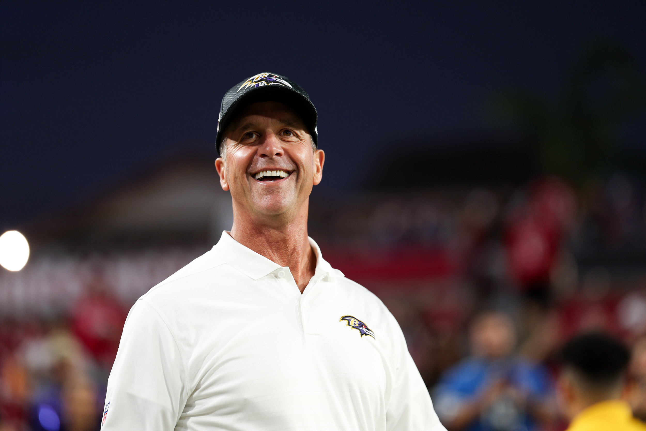John Harbaugh is watching film of two young quarterbacks