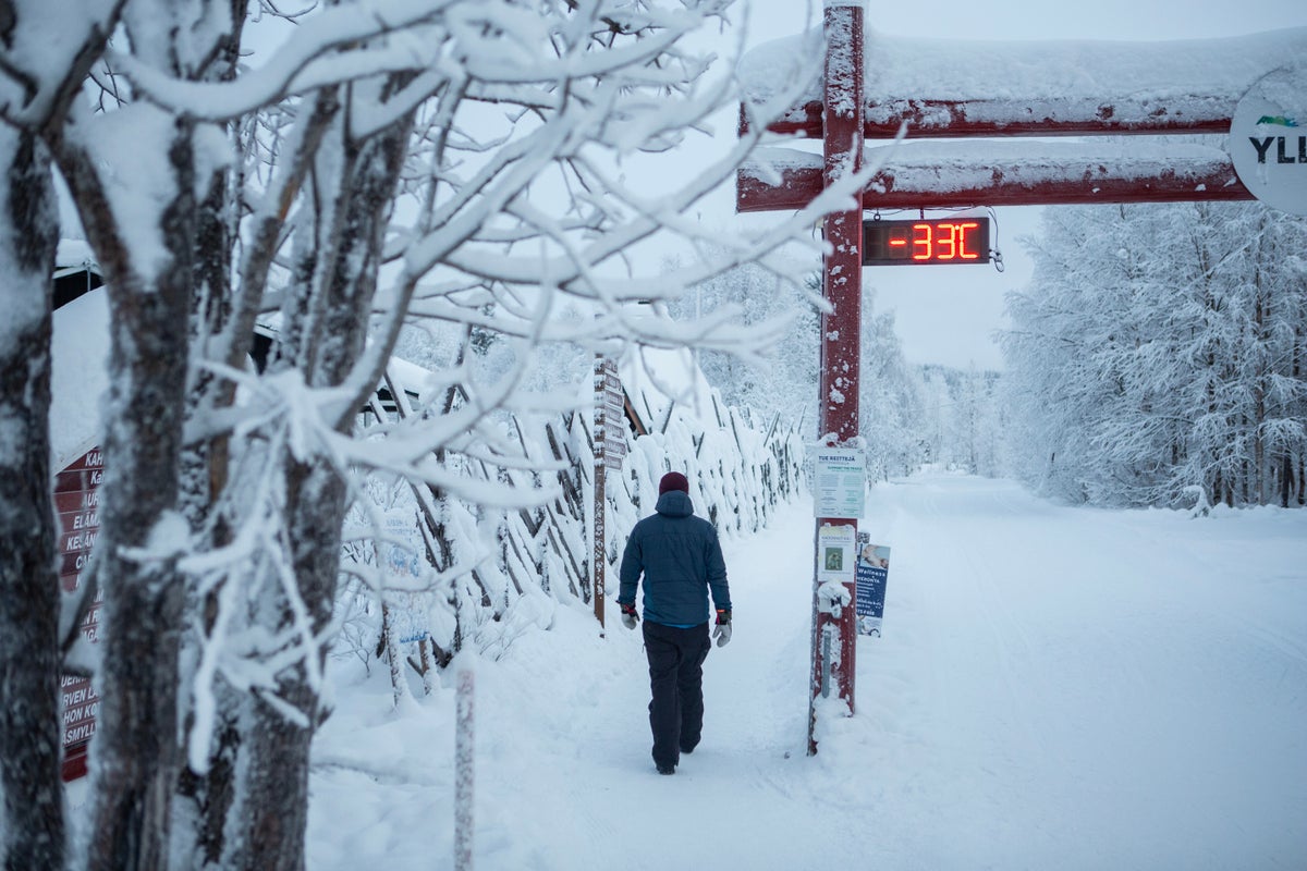 Thousands of tourists stranded as snow and deep freeze cancels flights