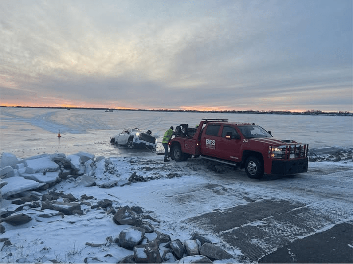 Ice fishing shacks falling through ice on Lake Poinsett