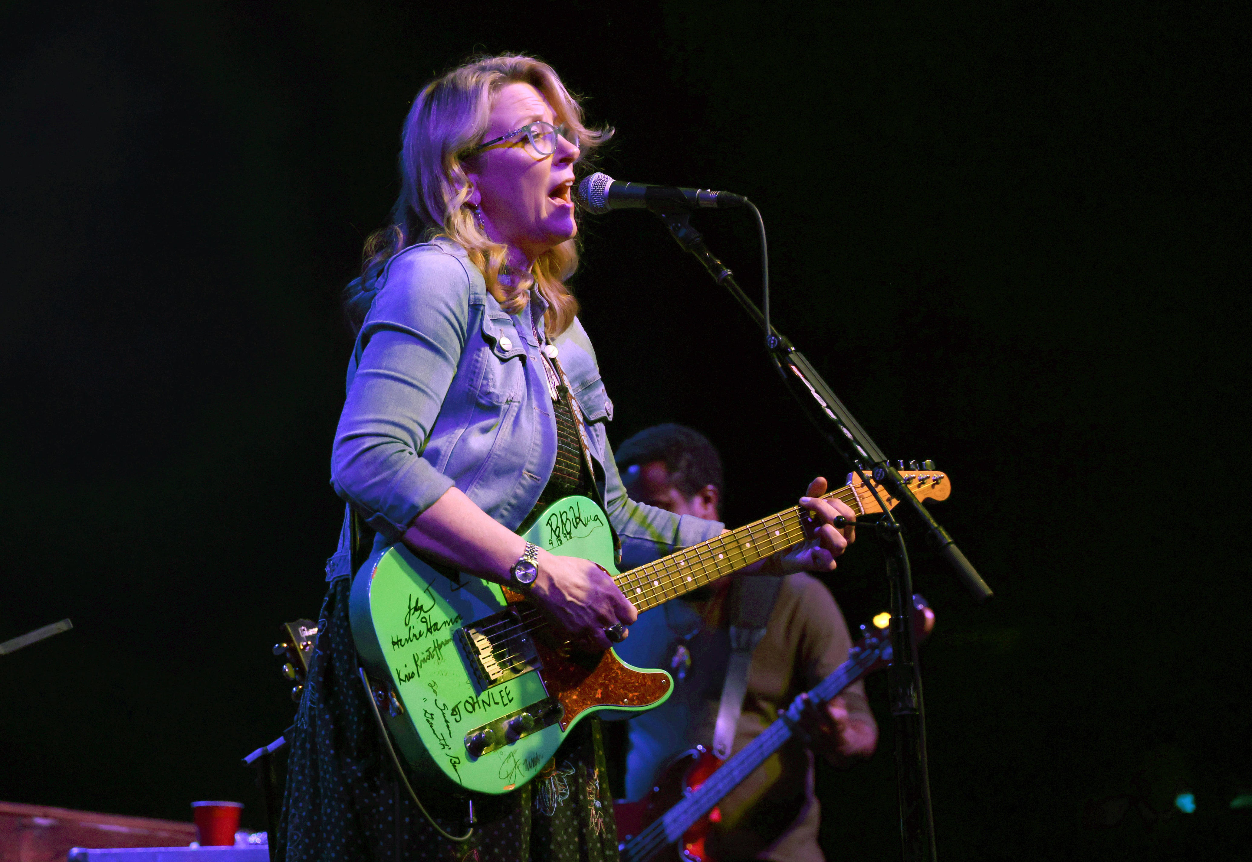 Who is singing the national anthem for the Bills-Jags wild card game?