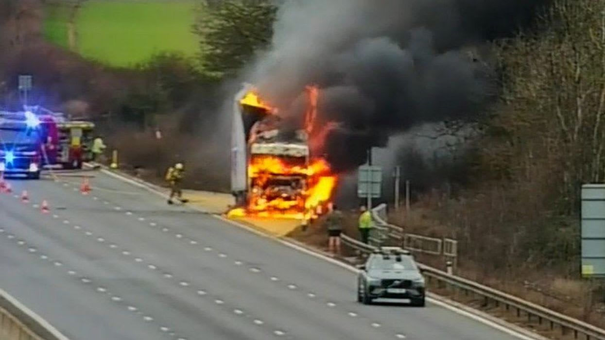 Lorry bursts into flames on side of the motorway as terrified drivers ...