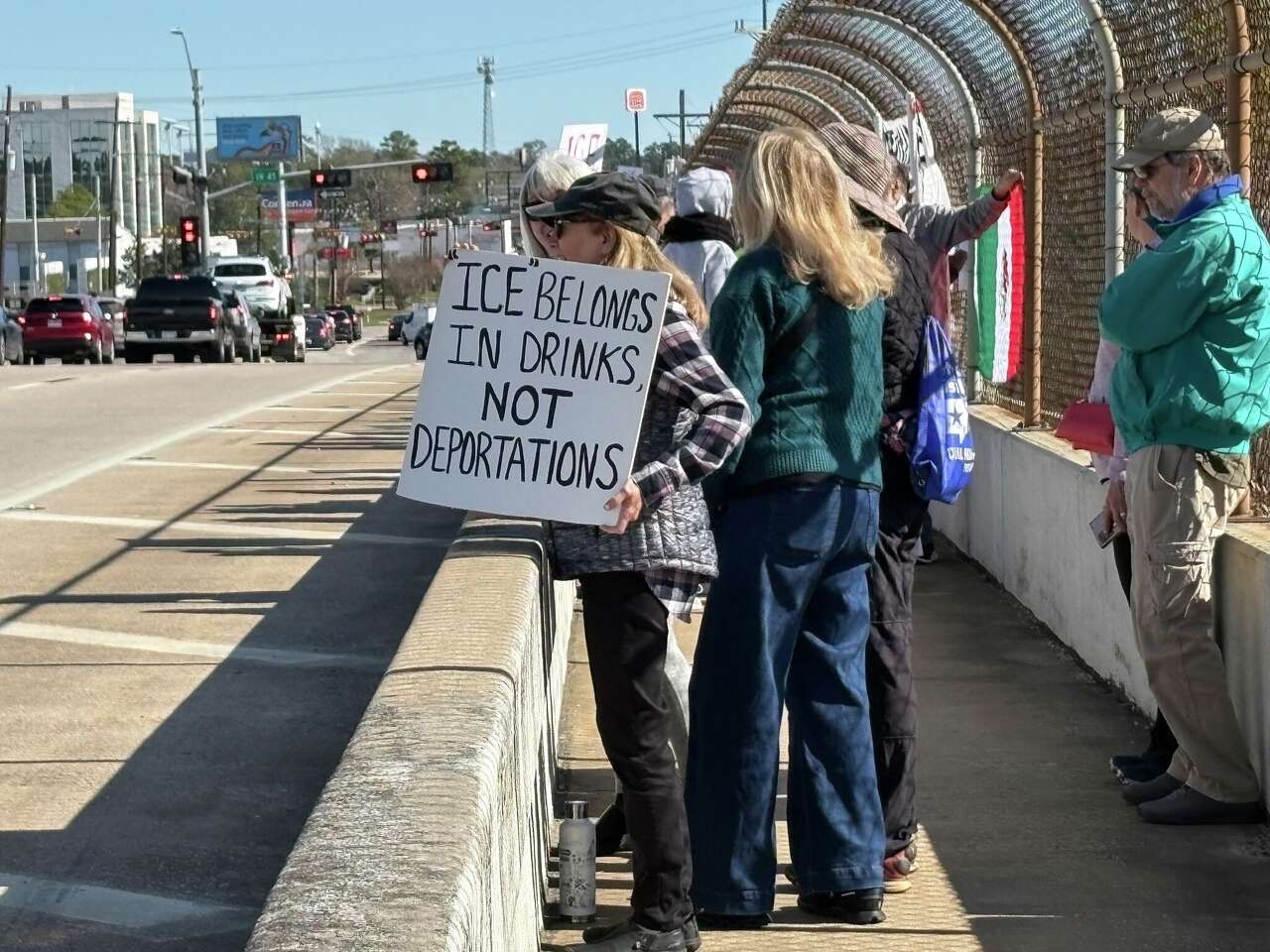 Montgomery County protesters pack Conroe overpass as outrage over ICE ...
