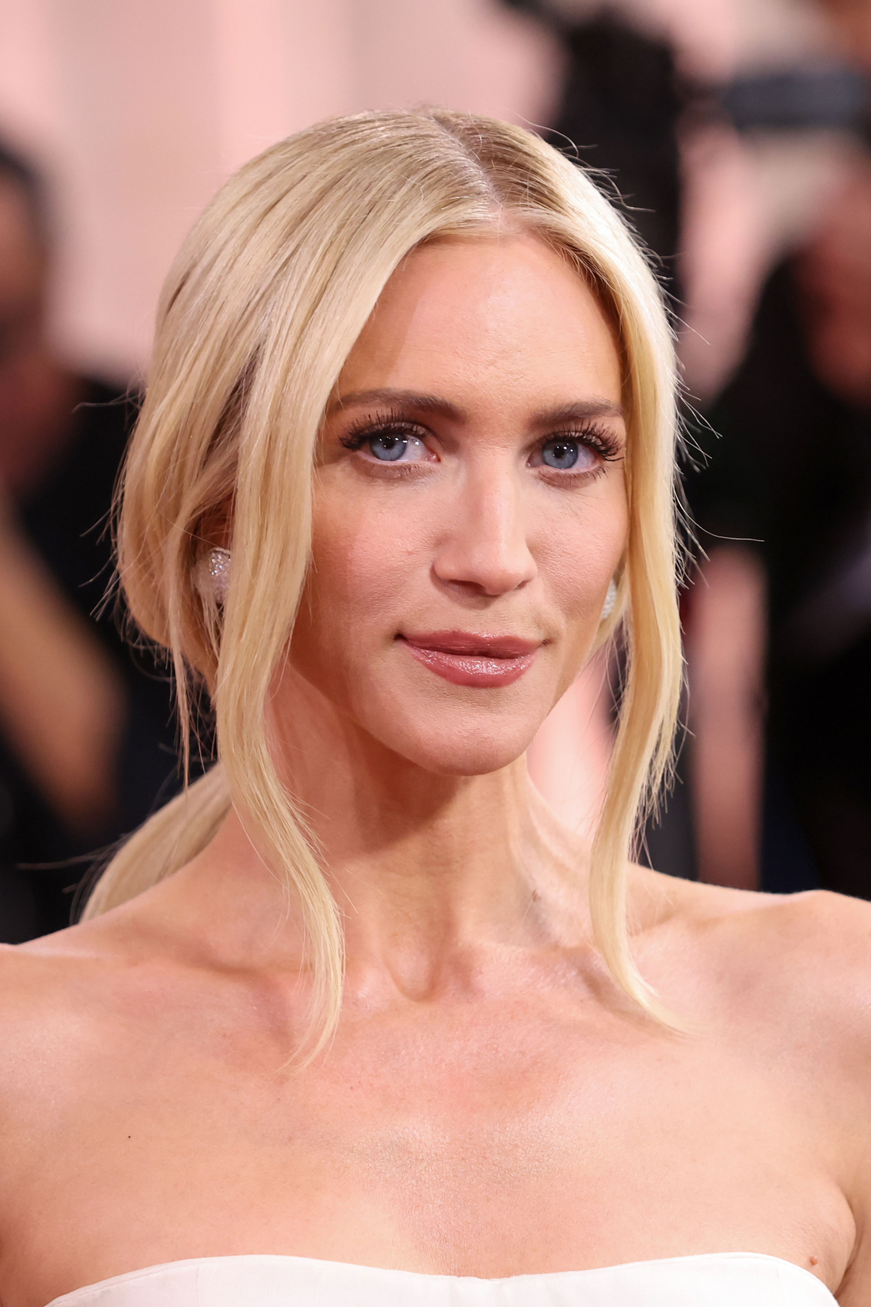 Say goodbye to the chignon—updos are getting looser and messier