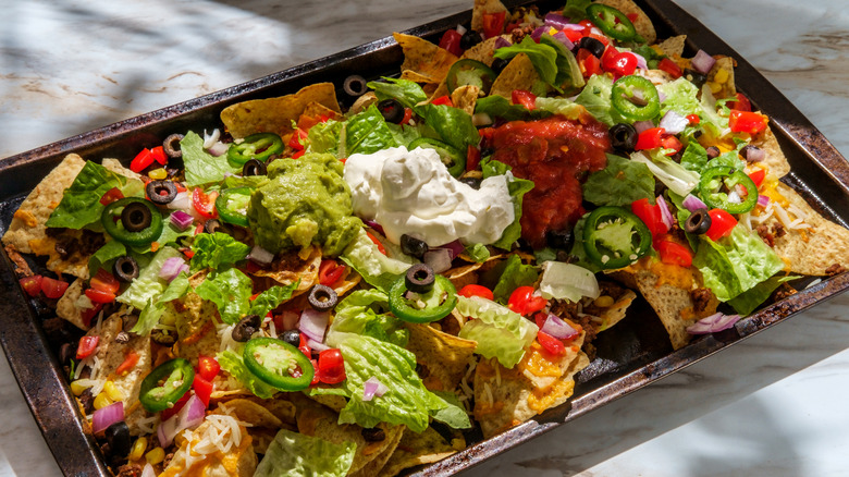 The trick to making a big batch of nachos that's not a soggy mess