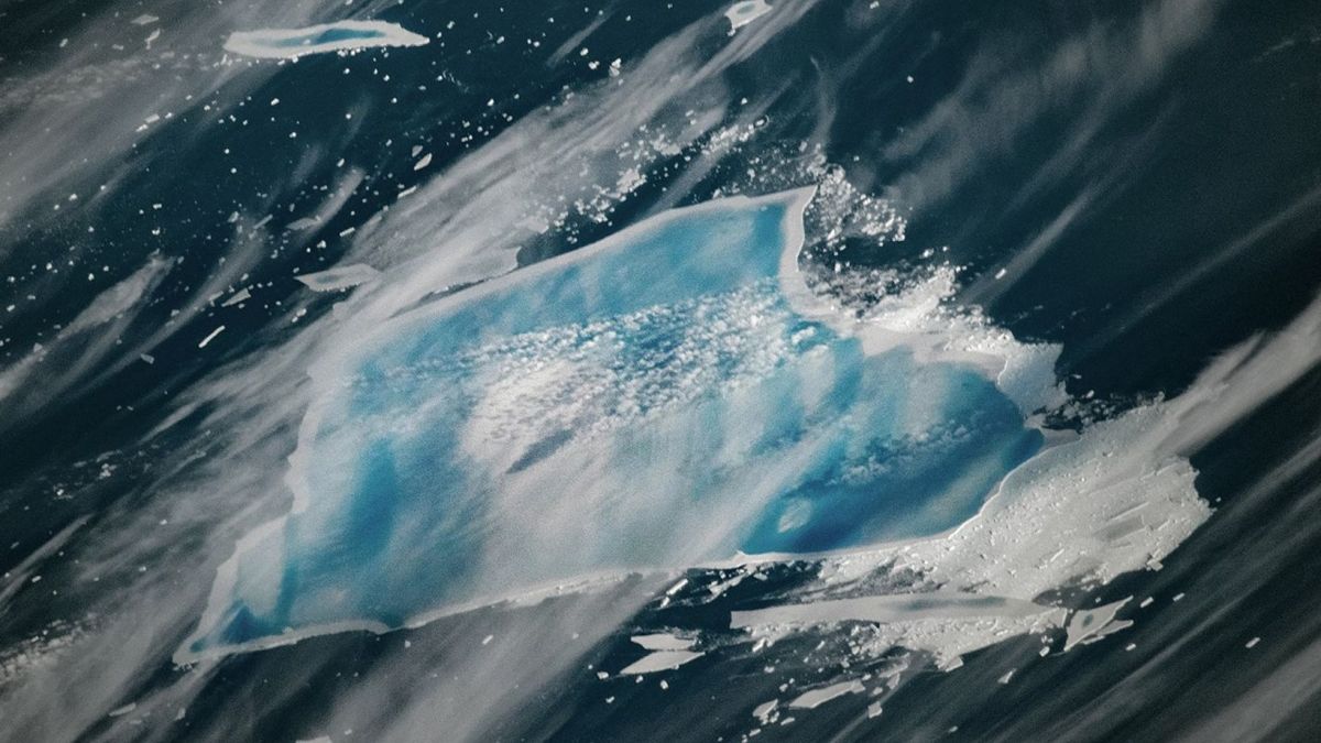 40-year-old iceberg turns vivid blue as it approaches total disintegration