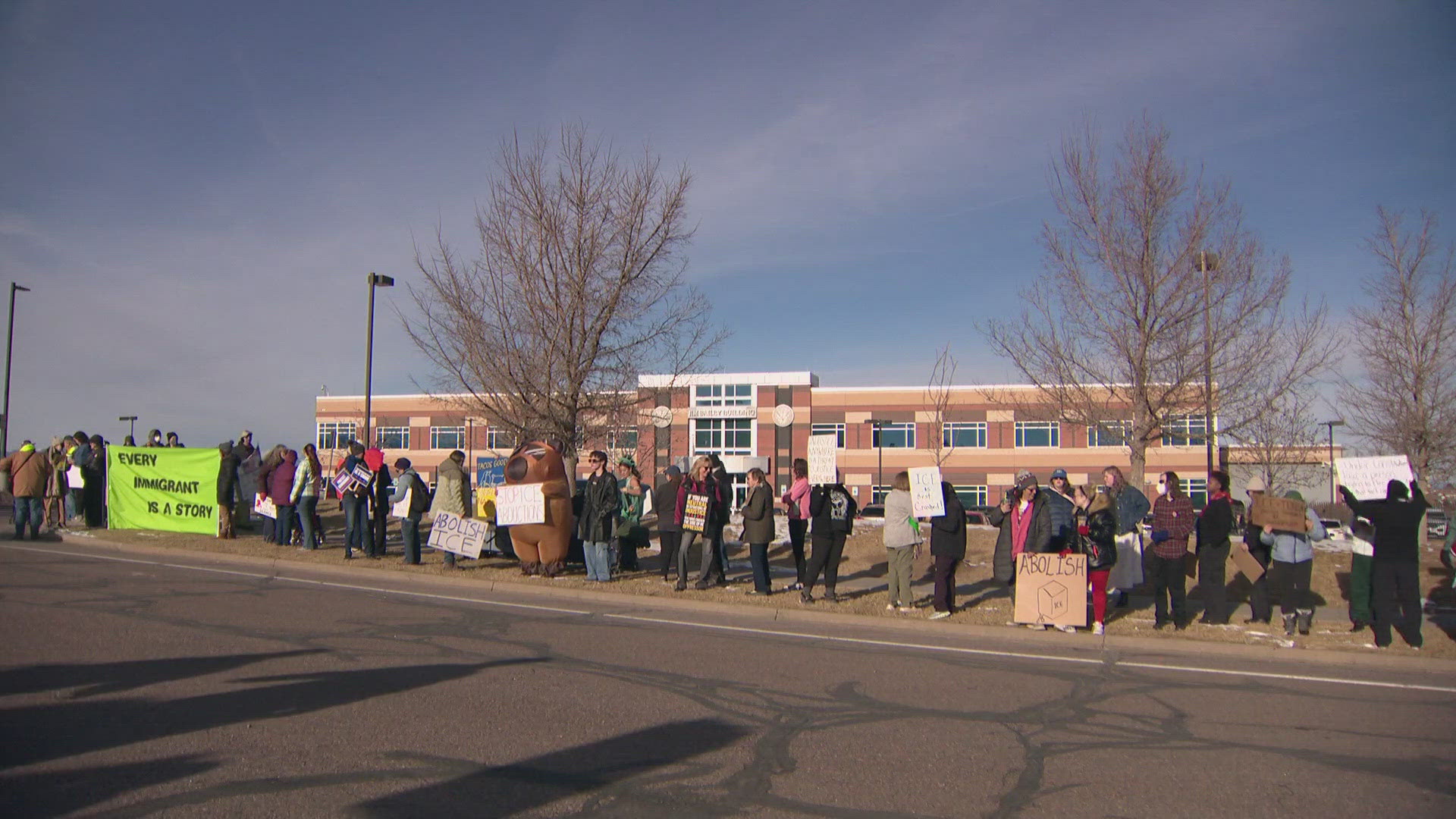 Protesters gather outside ICE office in Centennial