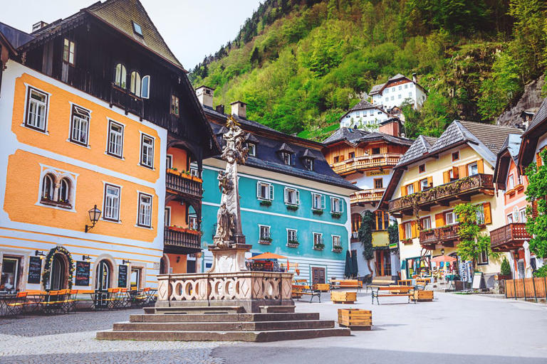 This postcard-perfect European village has cozy inns, dramatic mountain ...