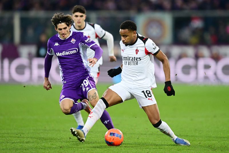 Soccer-Milan salvage draw at Fiorentina with late Nkunku goal