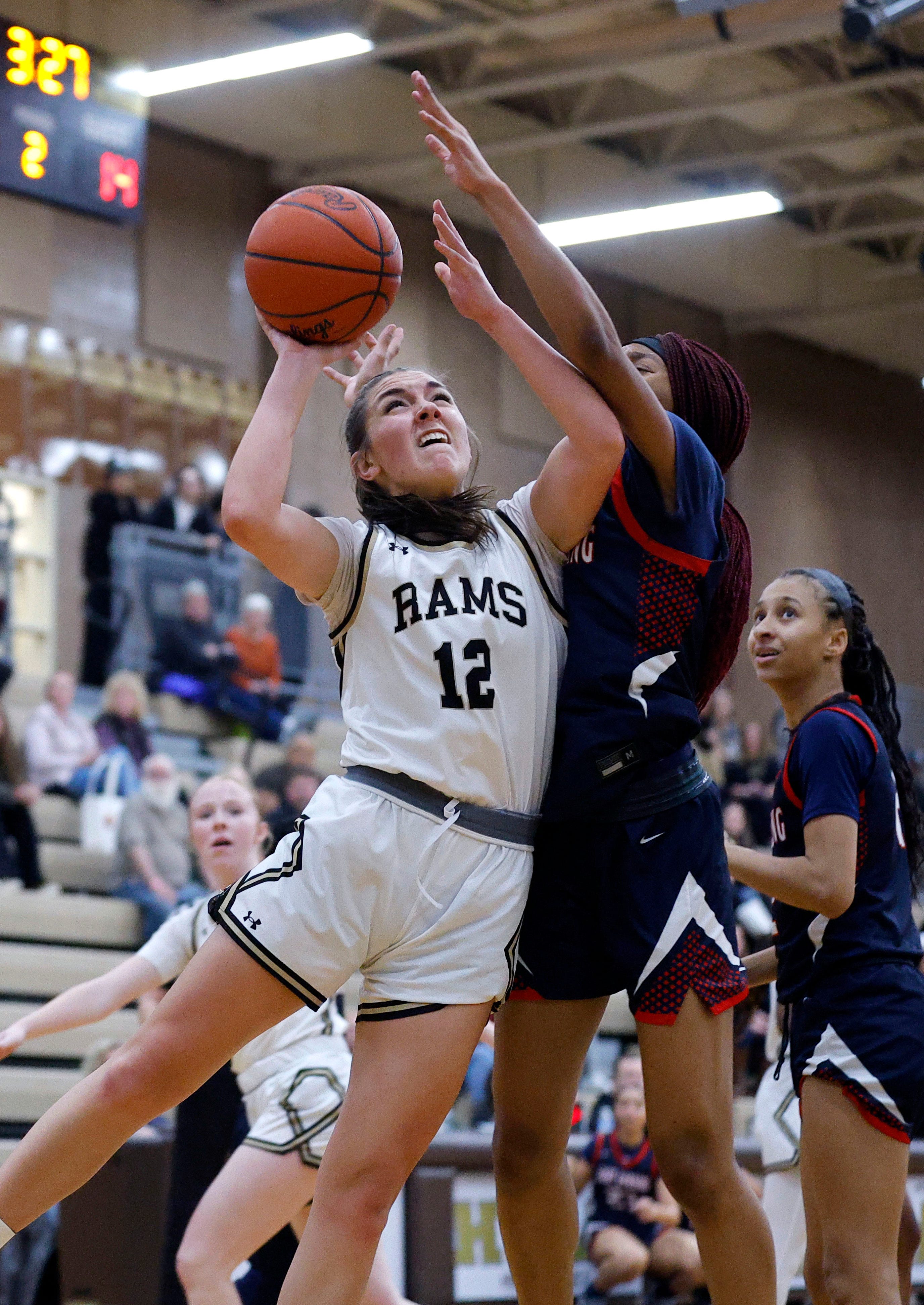 Girls basketball roundup: Holt edges DeWitt to earn share of CAAC Blue lead