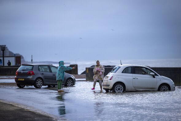 Met Office issues flood warning in 9 areas with 11cm set to fall - full ...