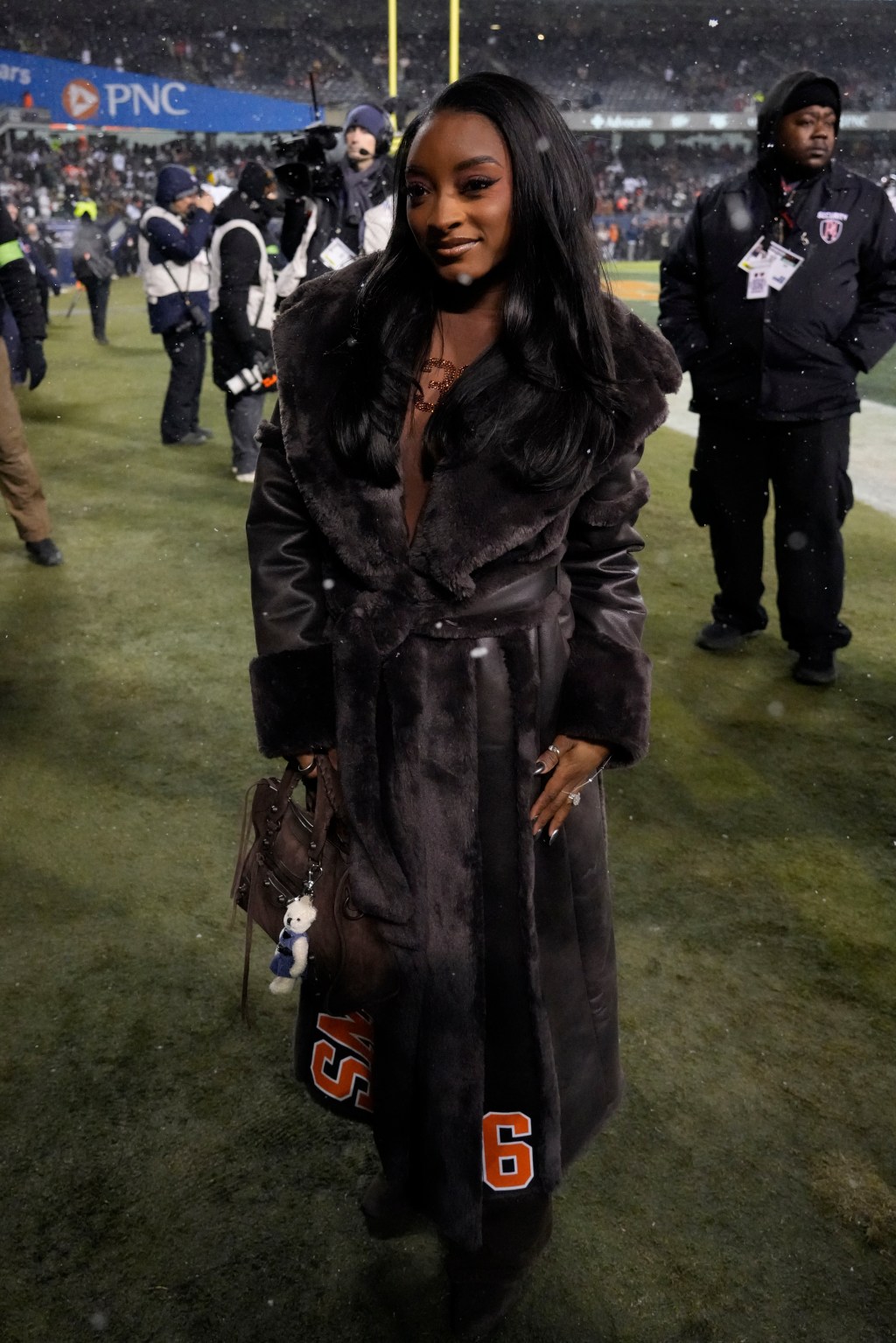 Simone Biles embraces Bears husband after thrilling playoff comeback ...