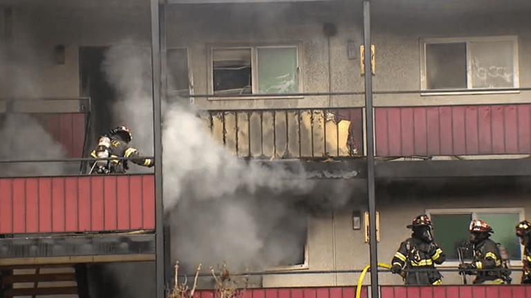 Two-alarm apartment fire in Seattle forces evacuations, heavily damages ...