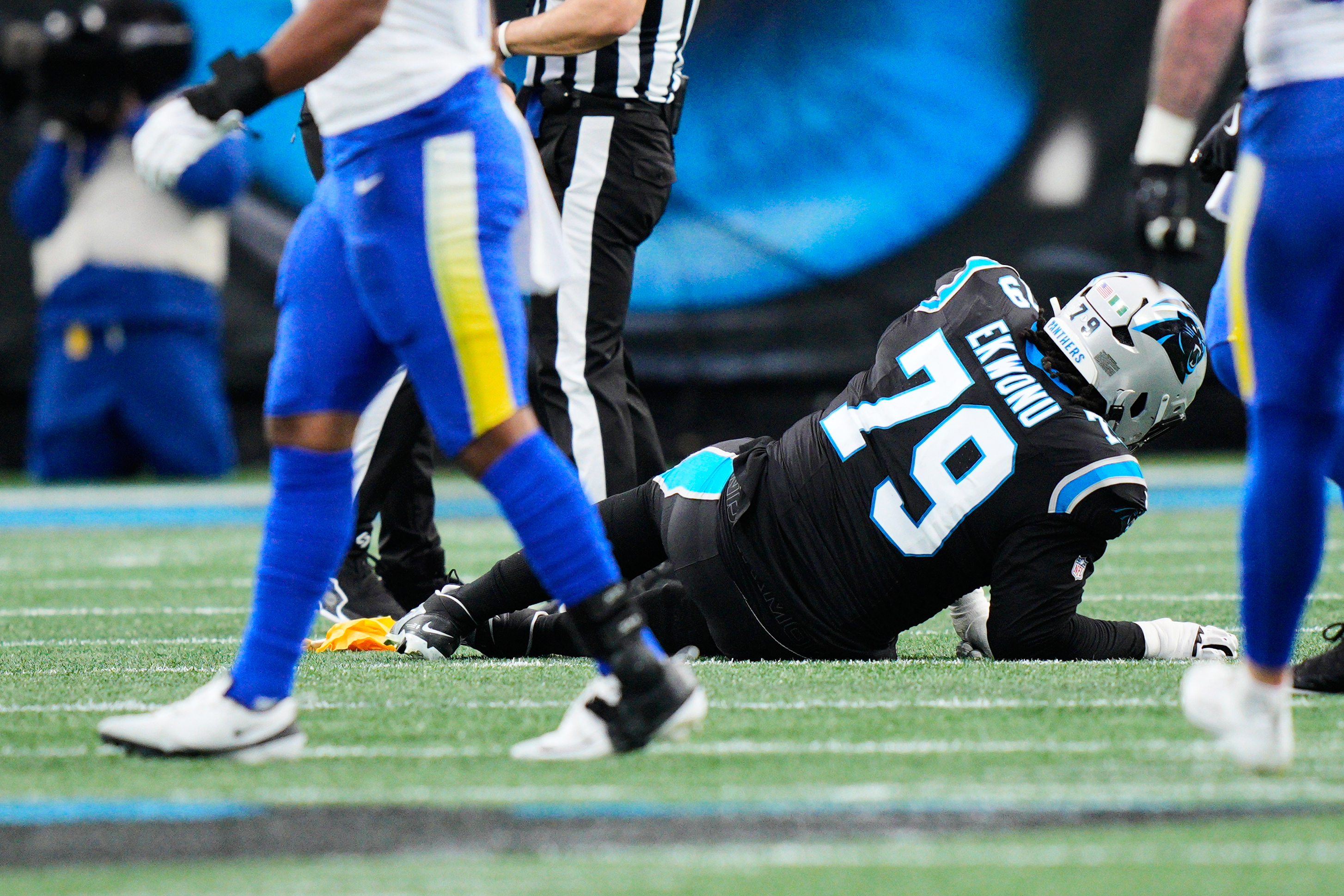 Panthers OL Ikem Ekwonu tore patellar tendon in playoff loss to Rams ...