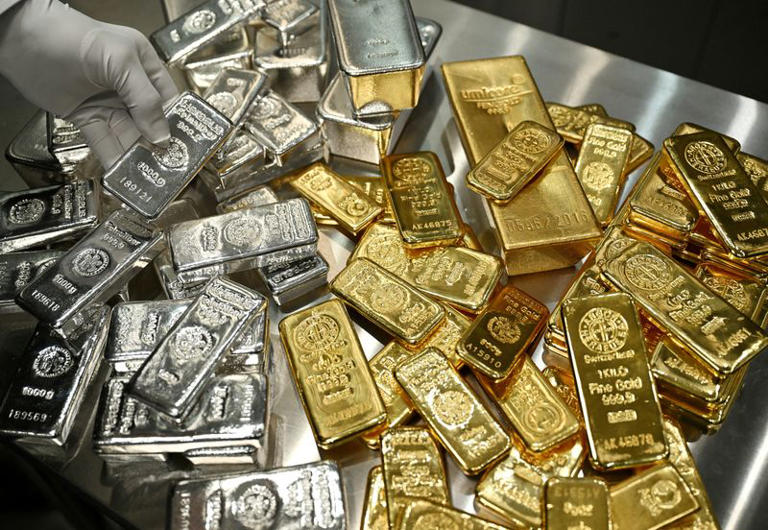 Gold vaults to record $4,600/oz as Trump-Powell clash unnerves investors