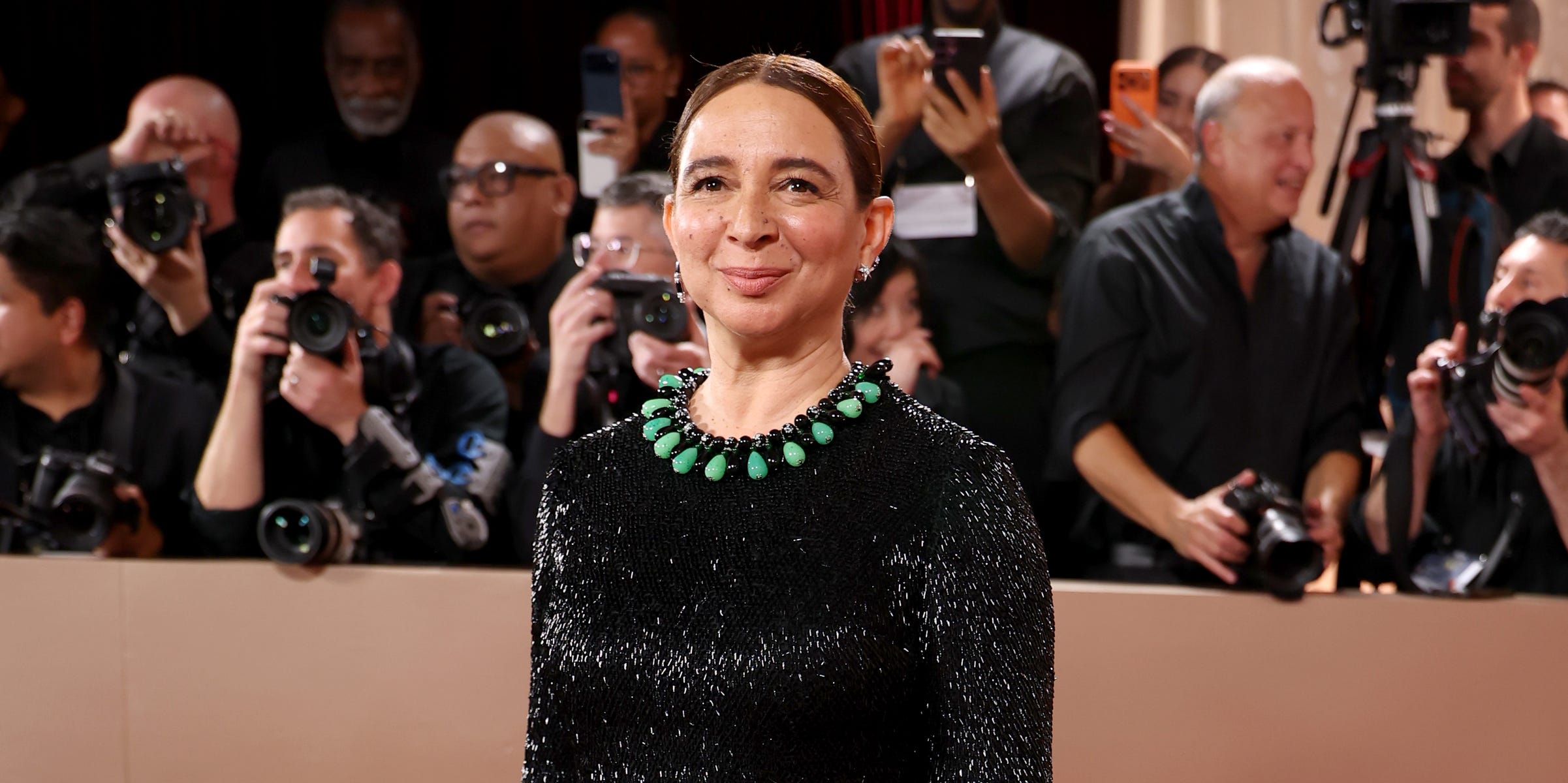 Maya Rudolph shines in Chanel while supporting partner Paul Thomas ...