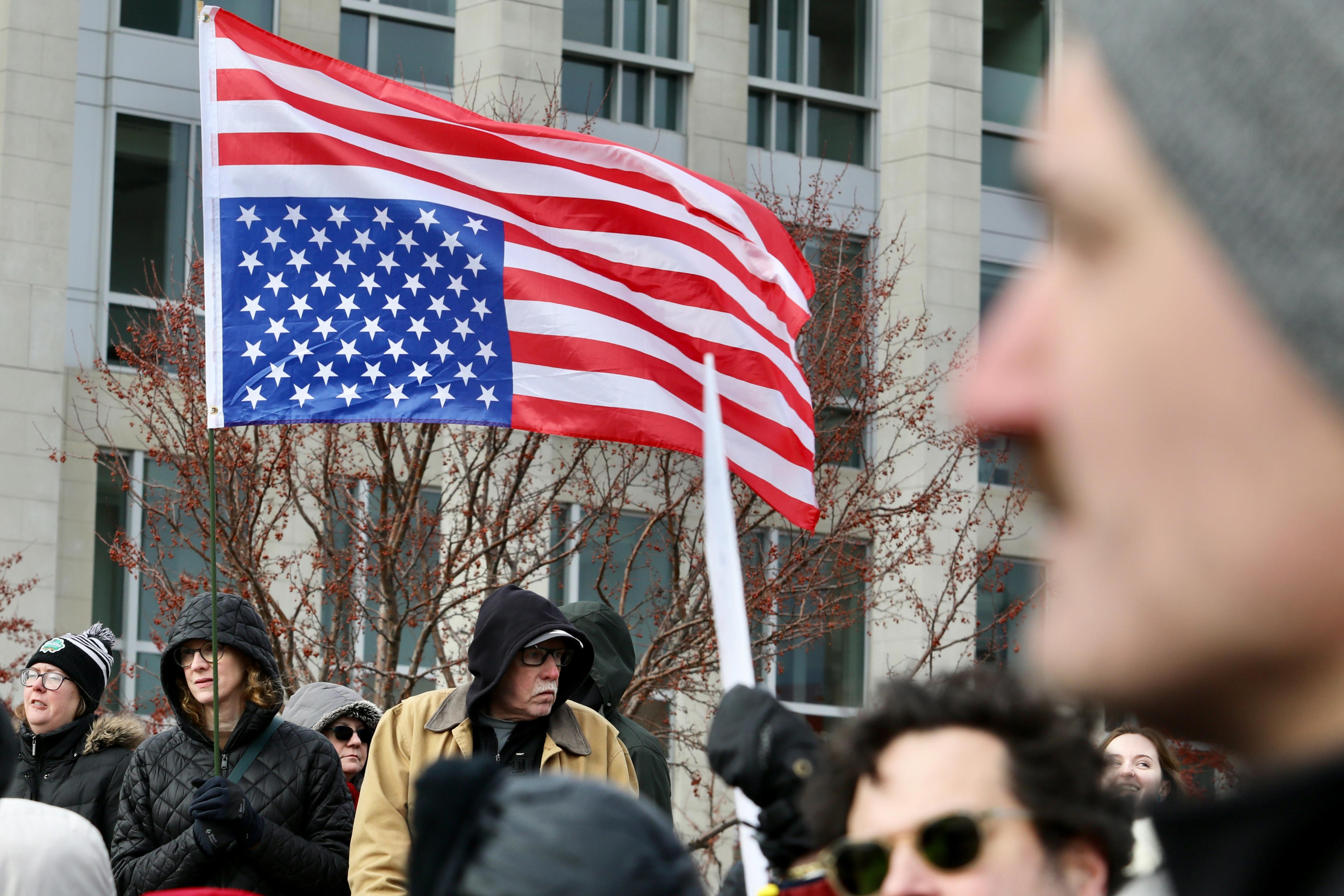 Rockford-area residents gather in solidarity after ICE shootings