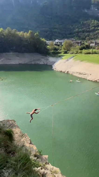 Epic rope swing cliff jump – heart-pounding action!