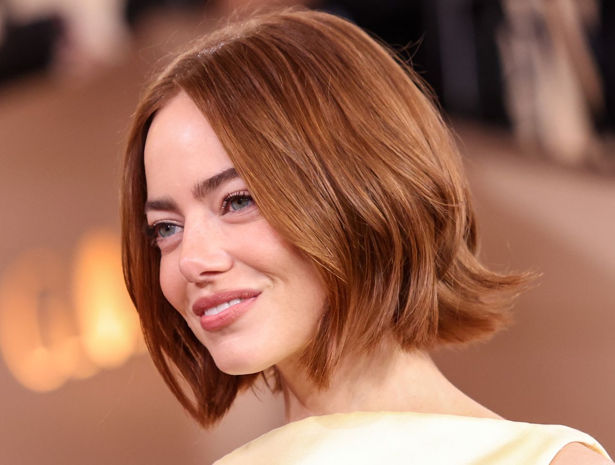 Emma Stone puts a red carpet spin on the crop top in flirty abs-baring ...