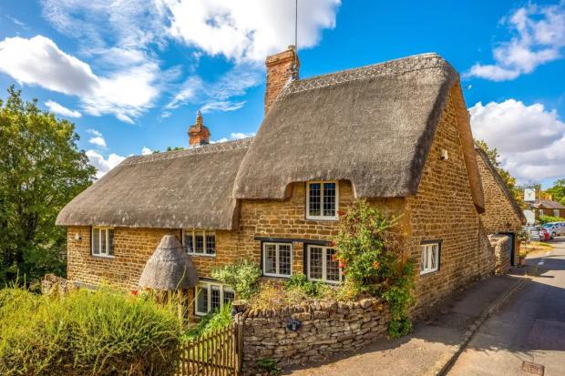 See inside 'delightful' thatched cottage on the market