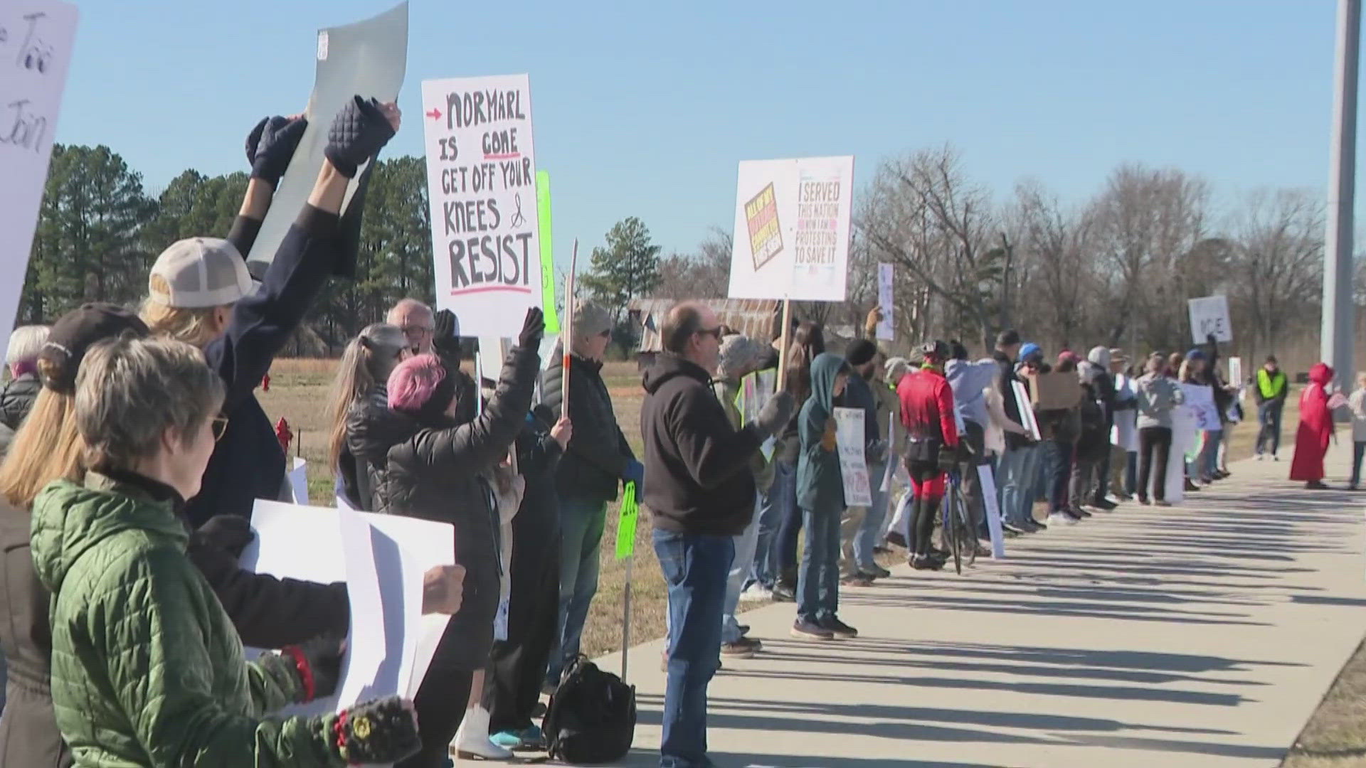 Demonstrators gather in Bentonville for anti-ICE protest