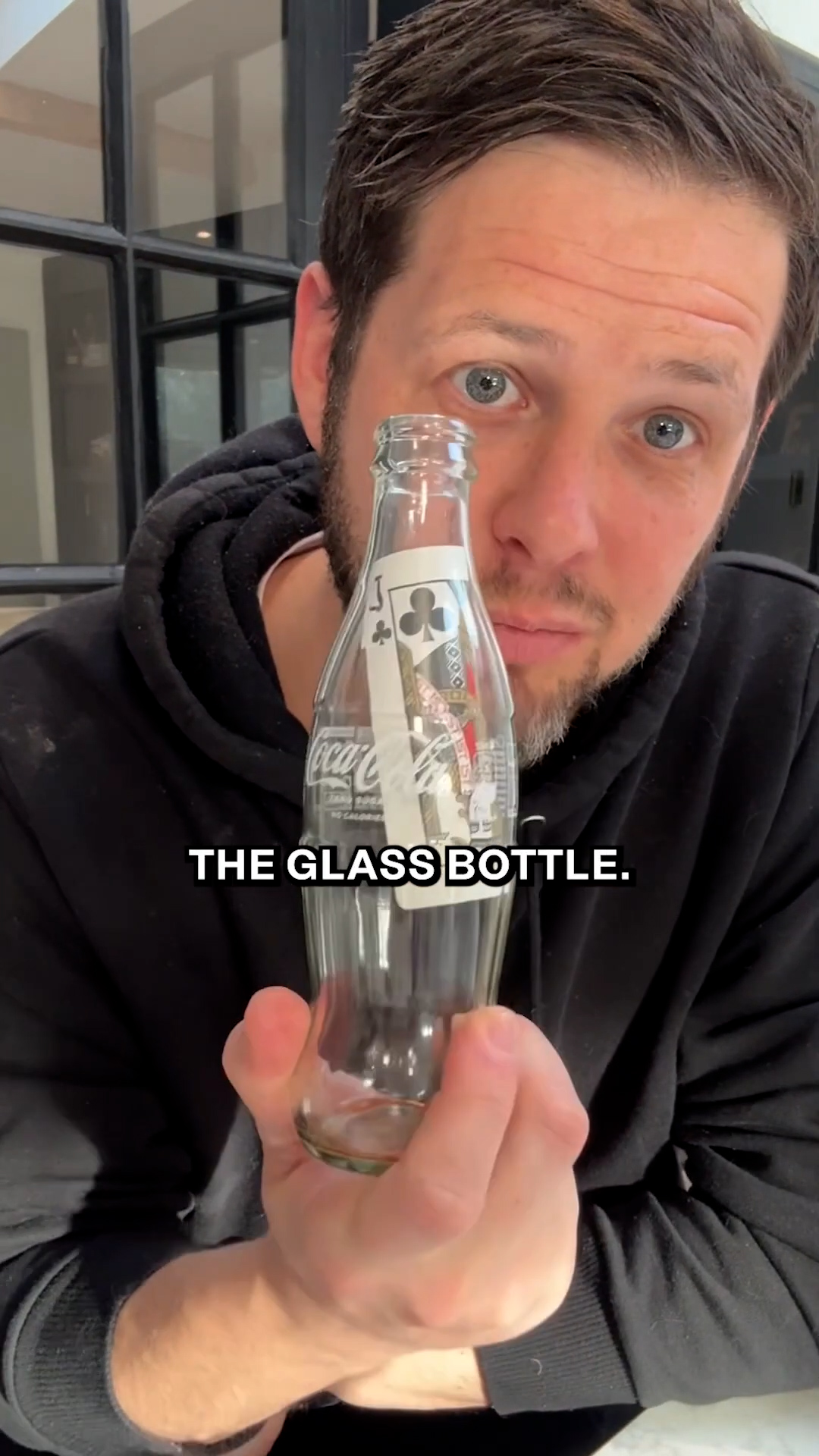 A chosen card inside a glass bottle