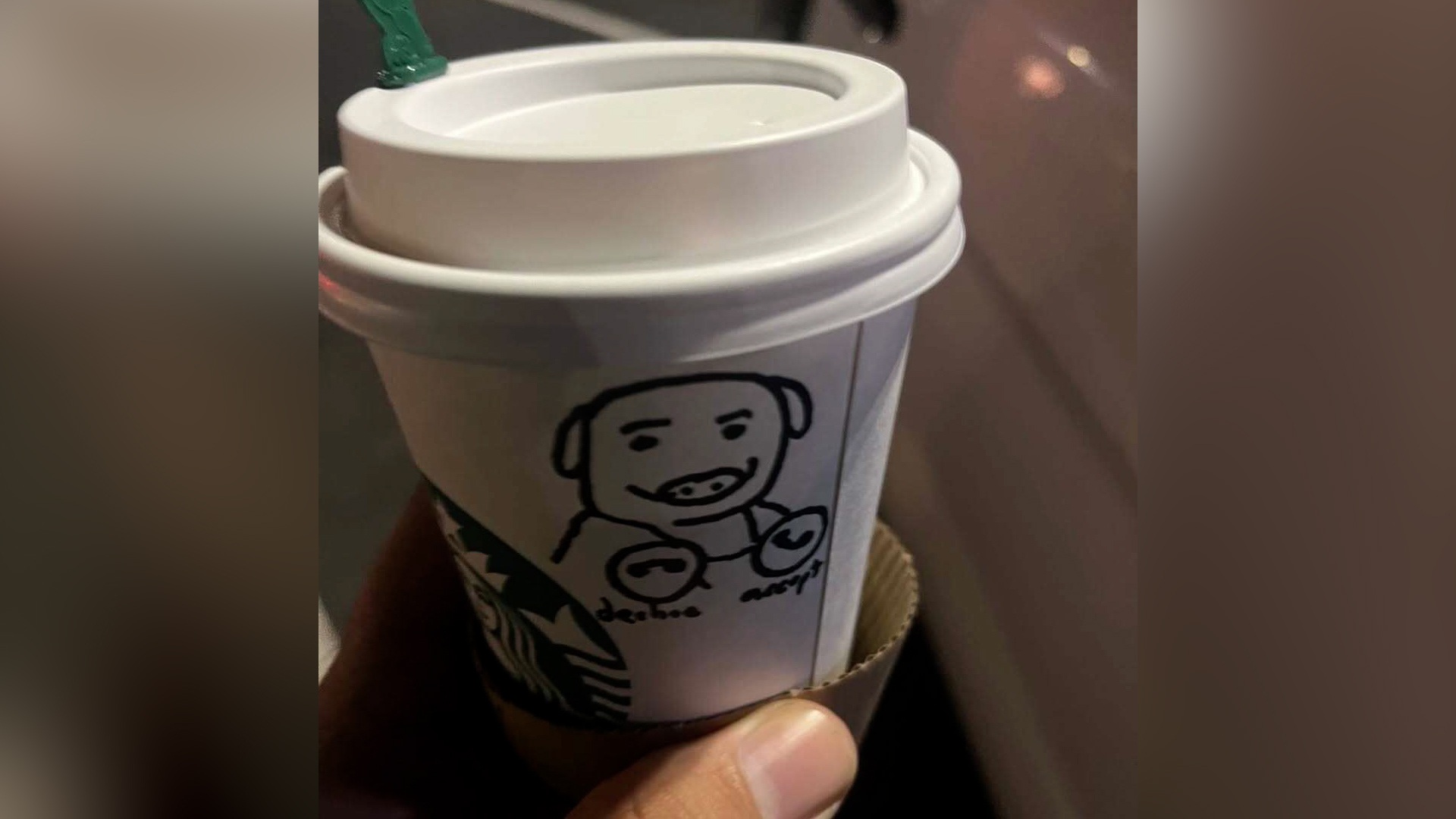 Deputy receives coffee cup with pig drawing from Norwalk Starbucks