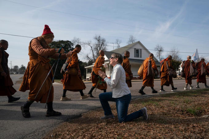 Buddhist monks and their dog, led by Vietnamese venerable, captivate ...