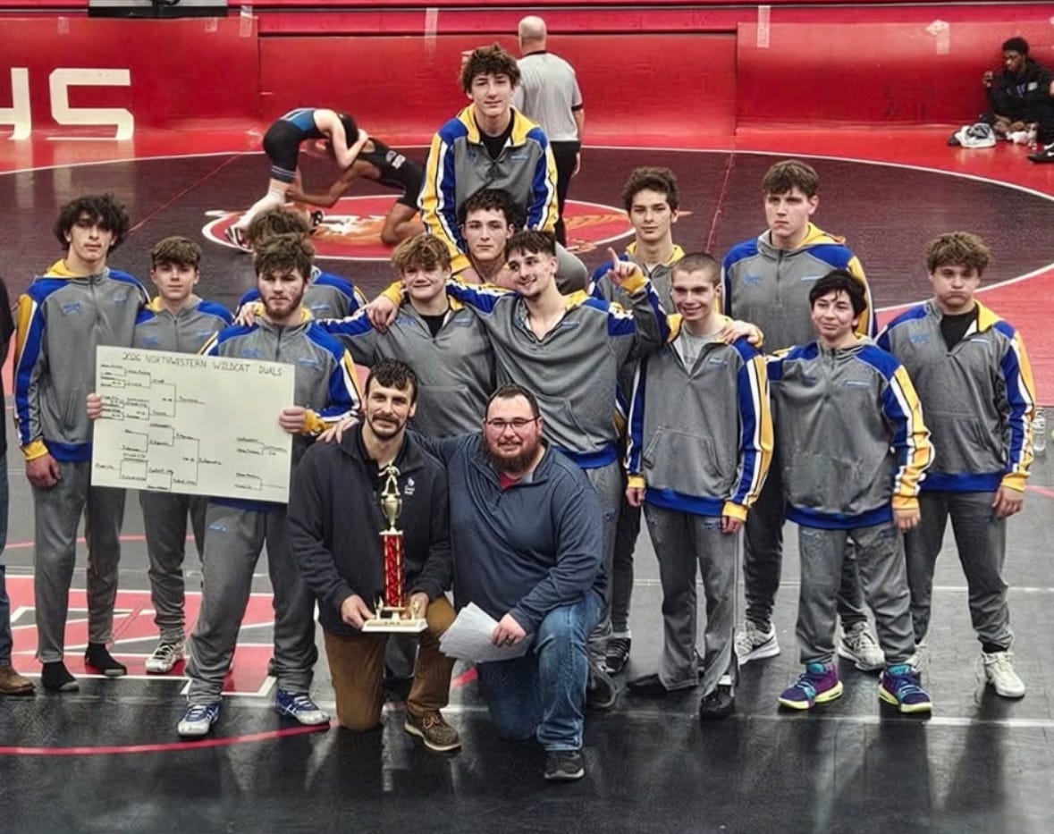 Which District 10 wrestlers medaled at Mid-Winter Mayhem?