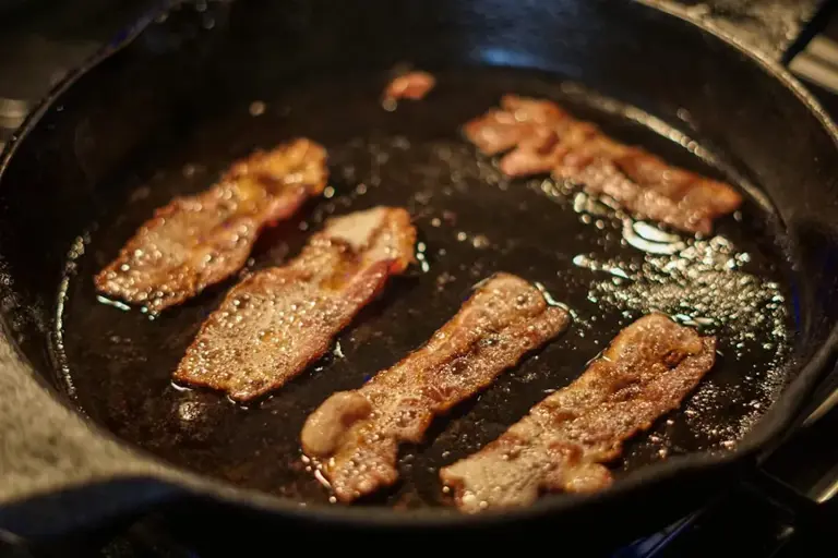 If you're still seasoning your cast iron like this, you're doing it ...