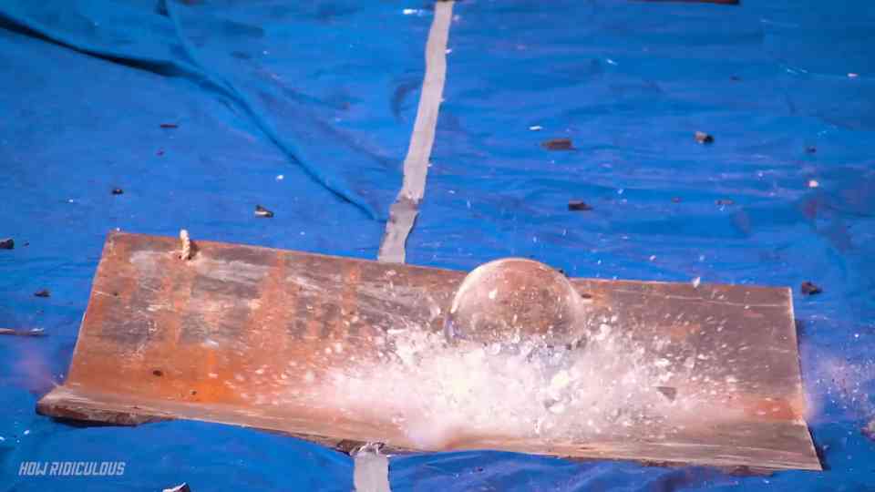 Can a solid glass ball survive a 150-foot drop?