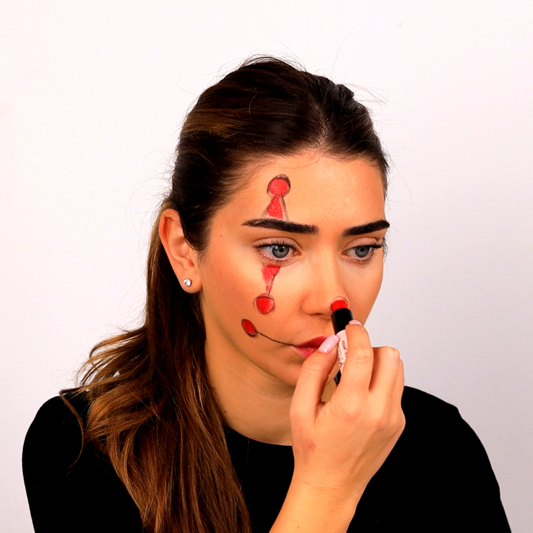 Sinister circus makeup look 🎭🩸