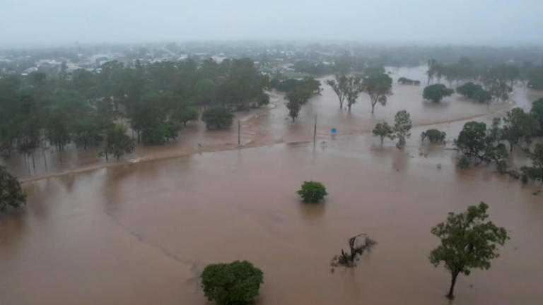 Queensland town records wettest day in 110 years as ex-cyclone lashes state